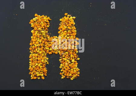 Pollen grains shaped Greek Alphabet Capital letters form word GYRH ...