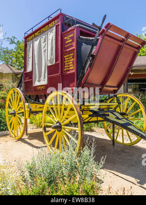 A restored stagecoach that once was a Bodie Stage Line Mud Wagon, a ...