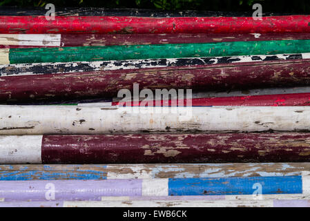 Stack of colourful, striped poles viewed from the right end Stock Photo ...