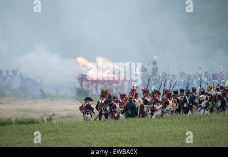 Reenactors in historic uniforms of the French Imperial Guard march ...