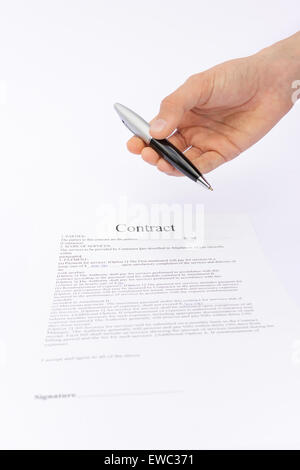 Hand giving pen Stock Photo - Alamy