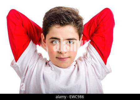 A cute Caucasian smooth-skinned boy is plugging his nose because of bad ...