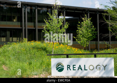 A logo sign outside of the headquarters of Realogy Holdings Corp., in ...