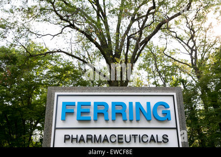 A logo sign outside of the headquarters of Ferring Pharmaceuticals Inc ...