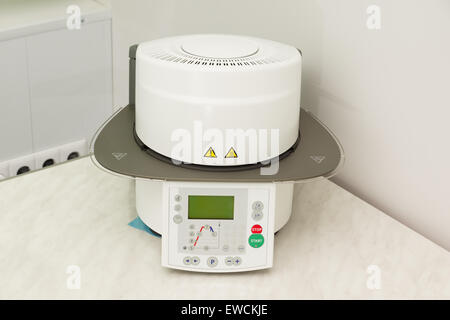 oven for baking ceramics used in dental laboratory Stock Photo - Alamy