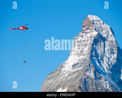 Air Zermatt, rescue helicopter during a rescue, Matterhorn Mountain ...