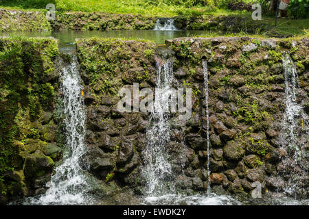 Waterfalls and basins of the Saai cold springs in Camiguin, Philippines ...