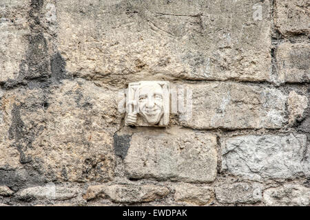 Hand carved Bath stone face on a wall in Walcot Street Bath one of more ...