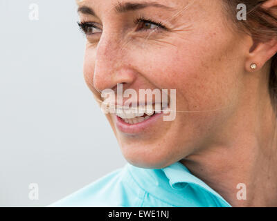 smiling young woman face Stock Photo - Alamy