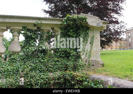 Beautiful stately mansion destroyed by fire surrounded by a stone ...