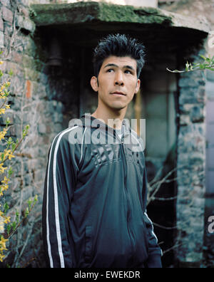 A migrant outside his squat in Calais France Stock Photo - Alamy