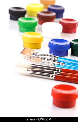 Painting brushes and color boxes on desk. Craft composition with copy ...