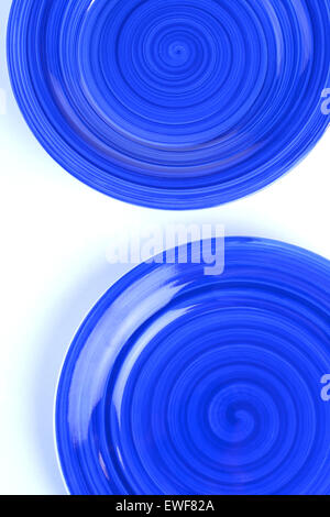 Clean plates on color background Stock Photo - Alamy