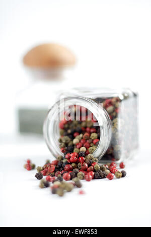 Mixed pepper seeds of various colours red black green Stock Photo - Alamy