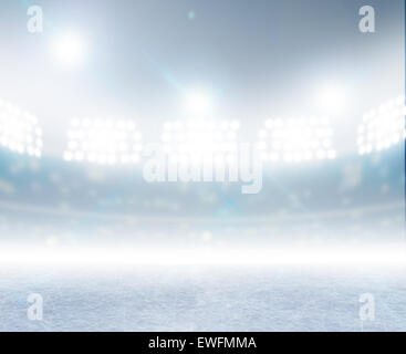 A generic ice rink stadium with a frozen surface under illuminated ...