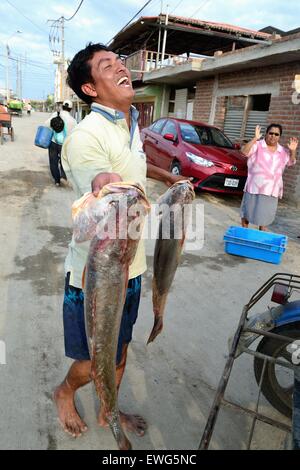 Latin Fisherman Selling Fishes In A Local Market Stock Photo - Alamy