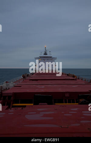 bulk laker ship underway at sunset Stock Photo - Alamy
