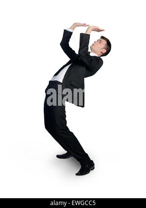 Young man holding nothing over a white background Stock Photo - Alamy