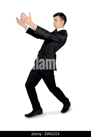 Isolated business man carrying something Stock Photo - Alamy