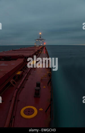 bulk laker ship underway at sunset Stock Photo - Alamy