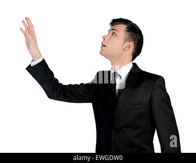 business man reaching to grab something from above his head, man in ...