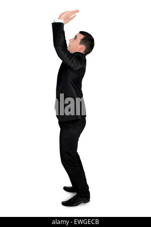 Isolated business man lifting something Stock Photo - Alamy