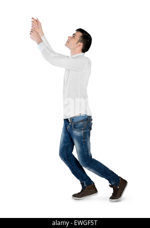 Isolated young man drag something Stock Photo - Alamy