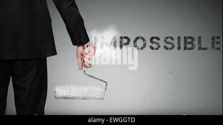 Impossible word painting on gray wall Stock Photo - Alamy