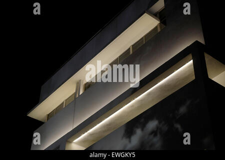 Protruding streamline balcony and a thin curved concrete shade of an ...