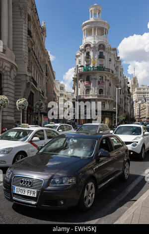 A vertical shot of Edificio Grassy building on Gran via street. Madrid ...