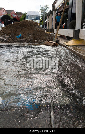 Broken Pipe Underground with Running Water Pouring Out Stock Photo - Alamy