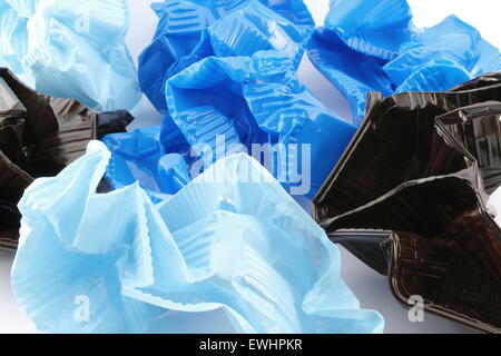 Tangle of small containers, plastic, linked between them Stock Photo ...