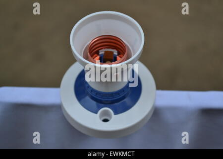 thready lamp holder in a closeup view Stock Photo - Alamy