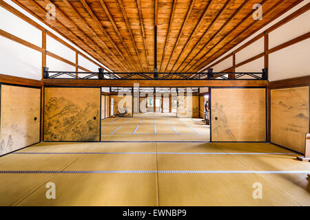Traditional Japanese temple hall interior with tatami mats and painted ...