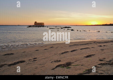 Fuzeta beach at the end of the day with old lifesaver's building ...
