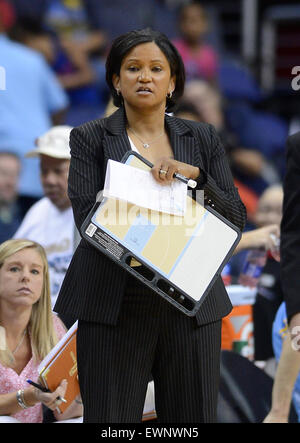 Chicago Sky head coach Pokey Chatman high fives her team before a WNBA ...