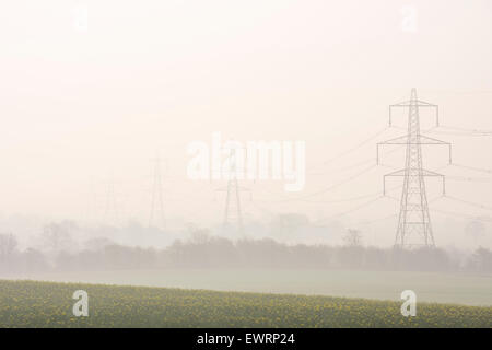 Pylons in mist near Ferrybridge, West Yorkshire Stock Photo - Alamy