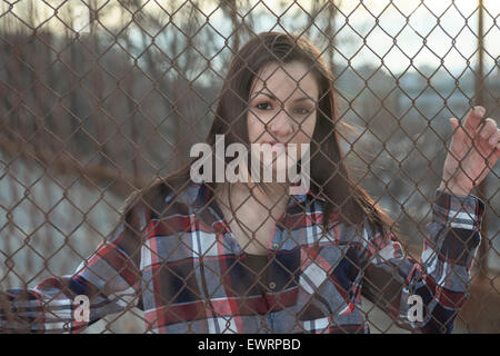 woman front fense Stock Photo - Alamy