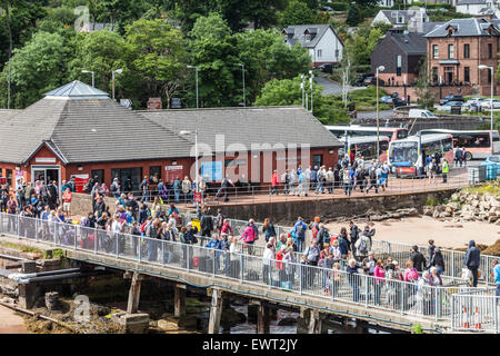 Passengers waiting at Brodick Pier to board the Arran Ferry, while ...