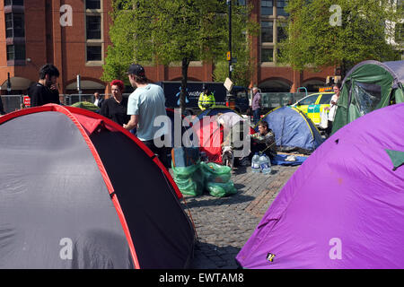 Tent 'City' in Albert Square surround William Gladstone statue ...