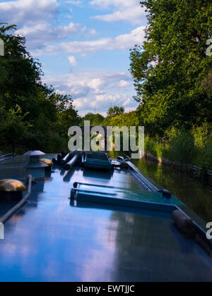 view from side of canal boat travelling down river Stock Photo - Alamy