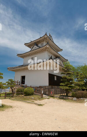 Marugame castle in Japan. Original castle keep, tenshu, in the sotogata ...