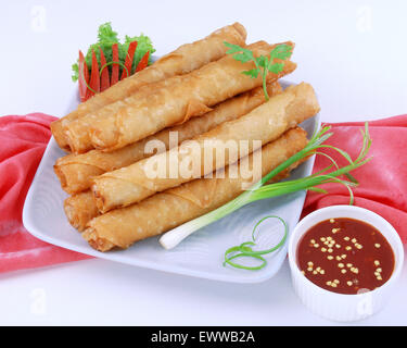 Chinese snacks - spring rolls and fried gyoza Stock Photo - Alamy