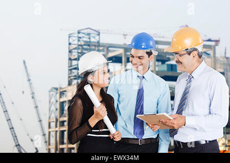 construction manager reading report at construction site Stock Photo ...