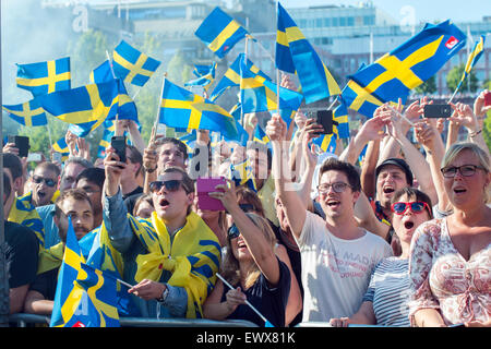 Thousands of Swedish football fans welcome back the Sweden players who ...