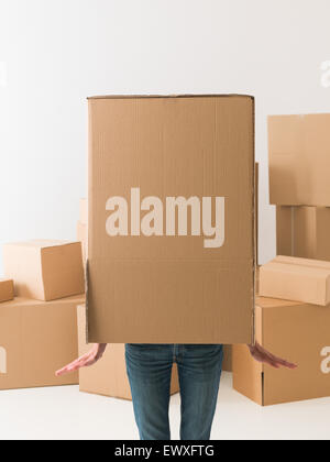 Girl hiding in an empty cardboard box Stock Photo - Alamy