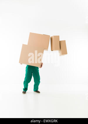 Unrecognizable man picking up a box of cherry tomatoes at a local flea ...