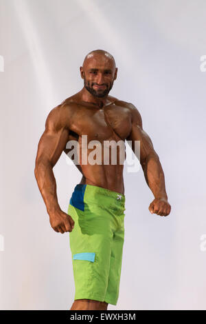 Bodybuilder On A competition For The Win - Front Poses Stock Photo - Alamy