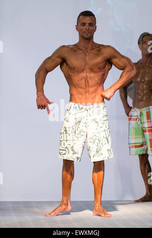 Bodybuilder On A competition For The Win - Front Poses Stock Photo - Alamy