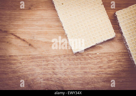 crisp and tasty wafers on a natural wood surface Stock Photo - Alamy